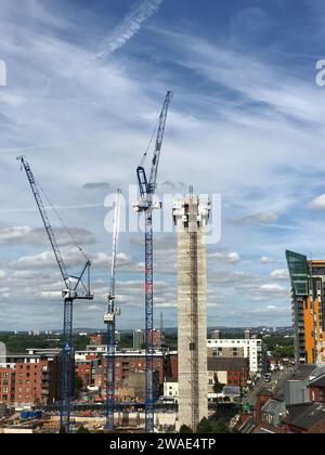 Modern and unfinished buildings outdoors. Construction site Stock Photo ...