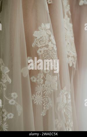 Intricate lace featuring delicate floral patterns and circular motifs ...