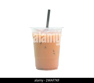Orange Thai iced condensed milk tea in transparent glass is isolated on ...