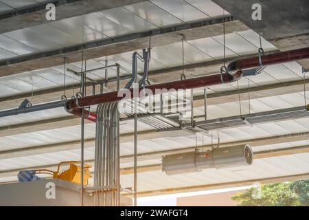 Ceiling with water supply and drainage communication pipes under the ...