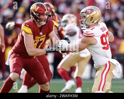 Washington Commanders tight end John Bates (87) looks on after an NFL ...