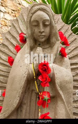 Virgin Mary statue with roses at Mission San Juan, San Antonio Missions ...