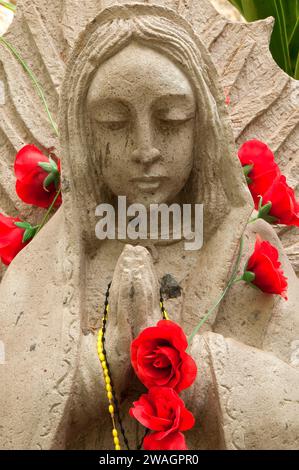 Virgin Mary statue with roses at Mission San Juan, San Antonio Missions ...