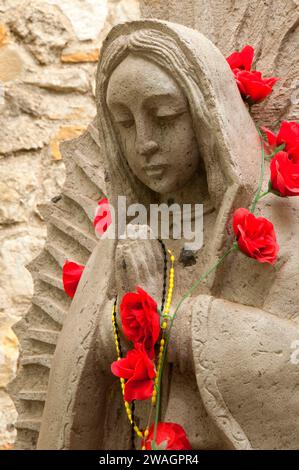Virgin Mary statue with roses at Mission San Juan, San Antonio Missions ...