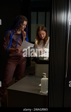 young businesswoman making copies on the photocopy machine at the ...