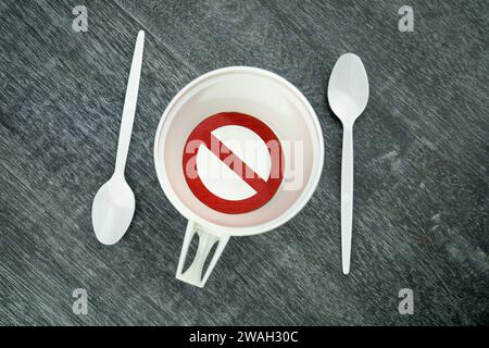 single-use tableware, plastic cutlery and prohibition sign, symbolic ...