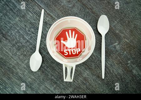 single-use tableware, plastic cutlery and stop sign, symbolic picture ...