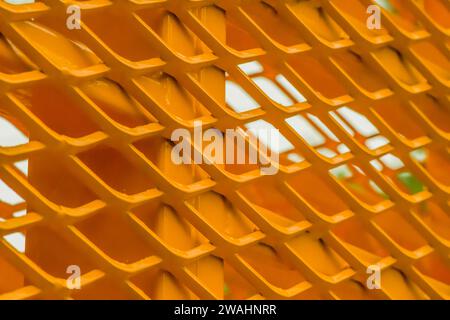 Macro of yellow metal structure with v-shaped patterns Stock Photo - Alamy
