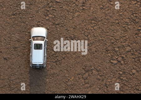 Concept for traveling and outdoor activities. Photo of a toy car on the ...