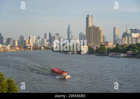 Boat ship traffic and tourist taking river cruise on Chao Phraya with ...