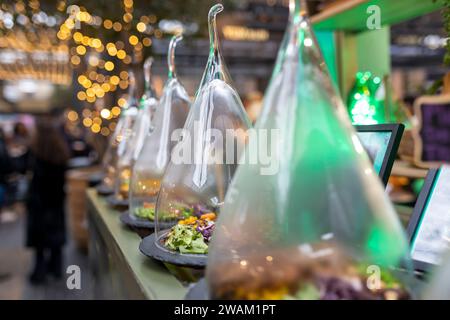 Falafel tortillas, legumes, salad under a glass jar for sale at the ...