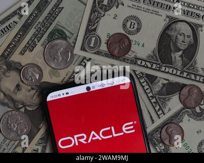 In this photo illustration, the Oracle Corporation logo seen displayed ...