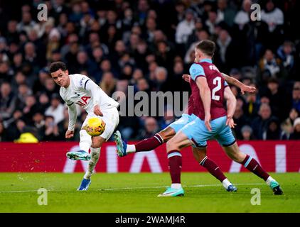 Tottenham Hotspur's Brennan Johnson (left) with his partner Tilde Syah on the pitch after the ...