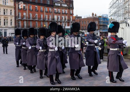 Windsor, UK. 4th January, 2024. The Pipes of Number 12 Company Irish Guards accompany Number 9 ...
