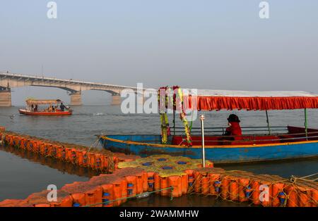 A boat seen anchored on the banks of the Sarayu river. The ancient city ...