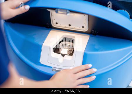 Doctor in the labaratory opens IVF cultivator. Insemination process of ...