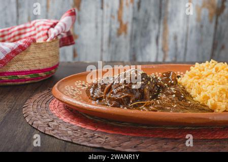 Mole, typical Mexican food. Traditional Mexican dish served in a clay ...
