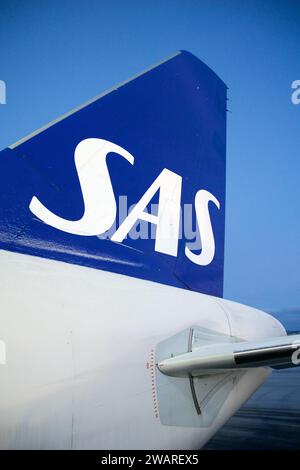 SAS airlines logo on the wing of a Scandinavian Airlines airplane ...