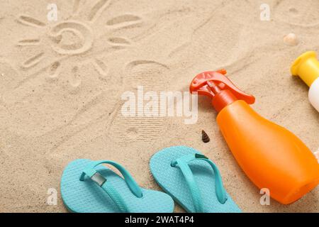 Creative composition with different sunscreen creams and palm leaves on ...