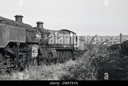 1975, historical, an old steam locomotive, 80098 sitting on a railway ...