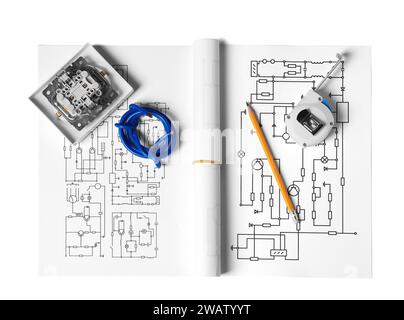 Wiring diagrams, tape measure and disassembled light switch isolated on ...