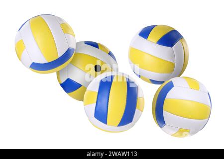 Many volleyball balls flying on white background Stock Photo - Alamy