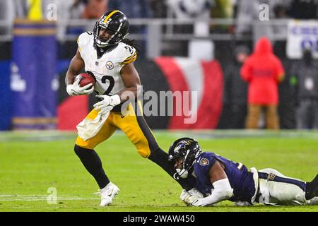 Baltimore Ravens linebacker Trenton Simpson (30) takes to the field ...