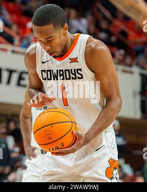 Oklahoma State guard Bryce Thompson (1) drives against Texas Tech guard ...