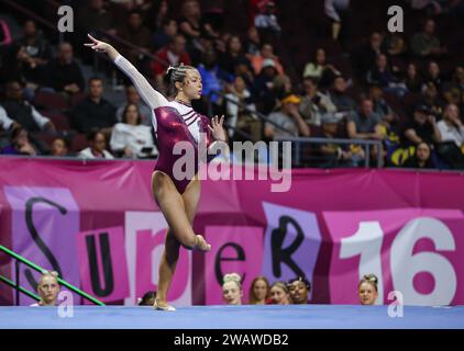 Alabama gymnast Cameron Machado competes on the uneven bars during an ...