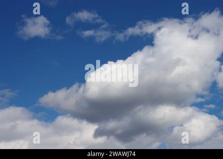 white clouds disappear in the hot sun on blue sky. Time-lapse motion ...