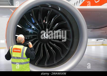 Olaf Gross, Licence Engineer at easyJet, checks the engine of an Airbus ...