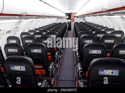 View into an empty aircraft compartment of an easyJet Airbus A320 neo ...