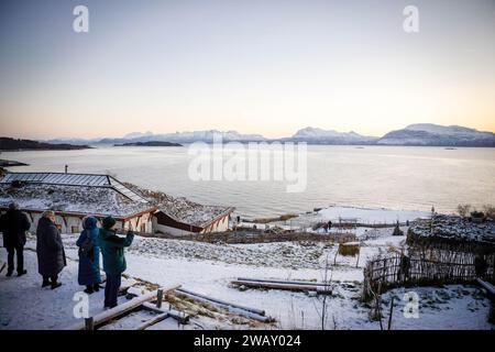 People walk around a Sami settlement during a visit to the medieval ...