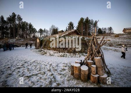 People walk around a Sami settlement during a visit to the medieval ...