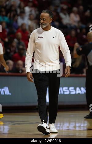 Virginia Tech coach Kenny Brooks talks with Clara Strack (13) and ...