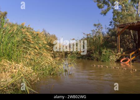 The Jordan river making a border between West Bank, Palestine, and ...