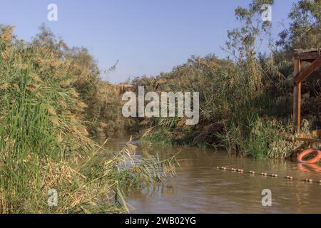 The Jordan river making a border between West Bank, Palestine, and ...