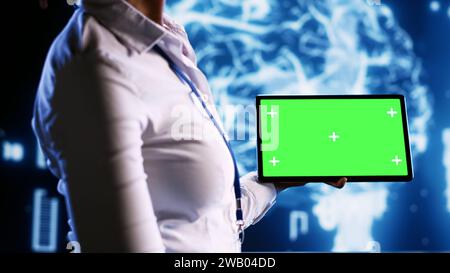 Admin in data center with green screen tablet using artificial intelligence computing simulating ...