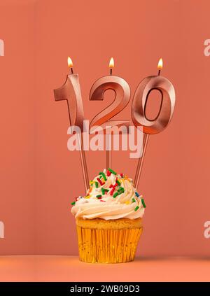 Birthday cake with number 120 candle - Anniversary card on a pink ...