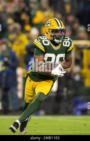 Green Bay Packers' Bo Melton stops New York Jets' Allen Lazard during ...