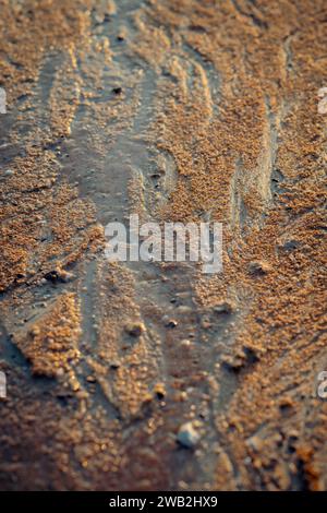 Golden brown sand of beach texture background Stock Photo - Alamy
