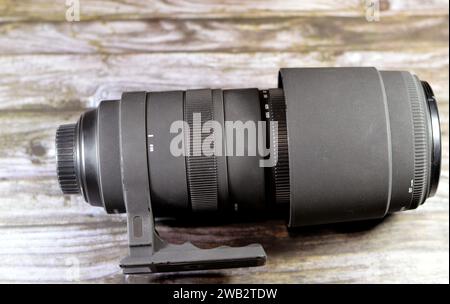 A telephoto lens, a specific type of a long-focus lens, the physical ...