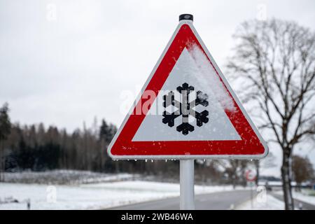 Diedorf, Bavaria, Germany - January 8, 2024: Warning sign for snow and ...