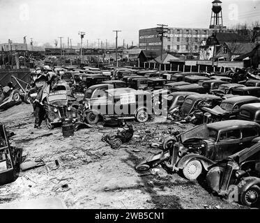 A Detroit auto graveyard, where junked autos and trucks are awaiting ...