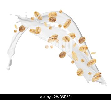 Rolled oats and milk splash isolated on white Stock Photo - Alamy
