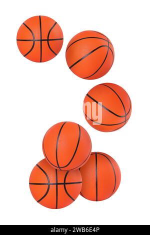 Many basketball balls flying on white background Stock Photo - Alamy