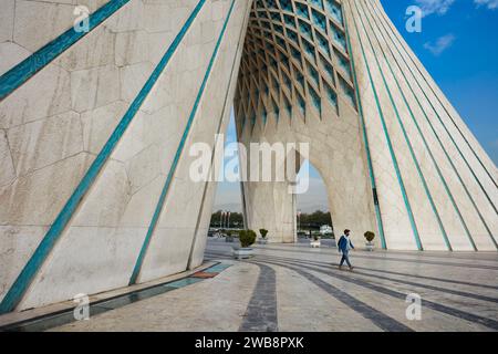 Man walks at the Azadi Tower (Freedom Tower), an iconic landmark in ...