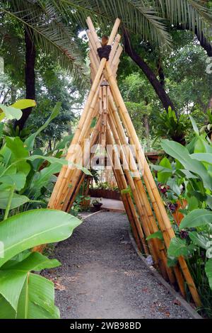 Bamboo bridge with unique traditional lights and woven bamboo as ...