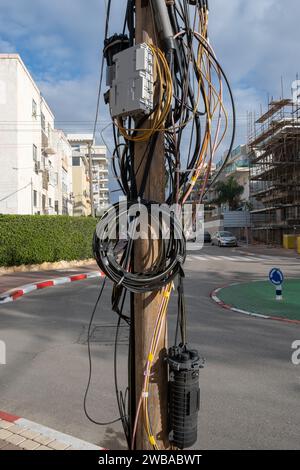 Fiber optic installation on home wall with obsolete CATV and new FTTH ...