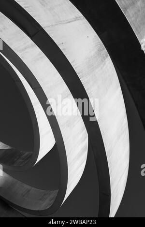 Striking monochrome architectural feature with sweeping curves and a ...